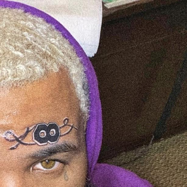 Famous People With Face Tattoos — Amber Rose, Chris Brown, and More