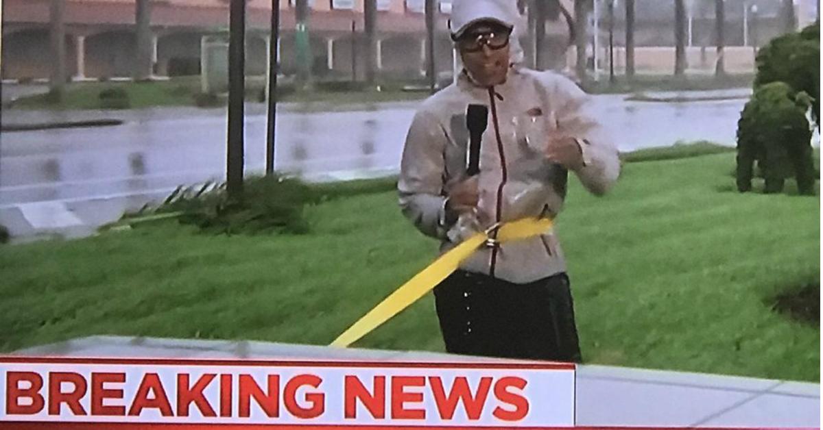 Photo Of Storm Reporter Harnessed To A Building Has People Asking Questions