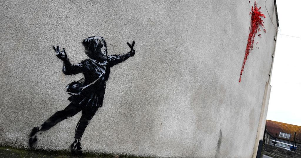 What Does Banksy Look Like? The Artist Revealed Himself in a Video