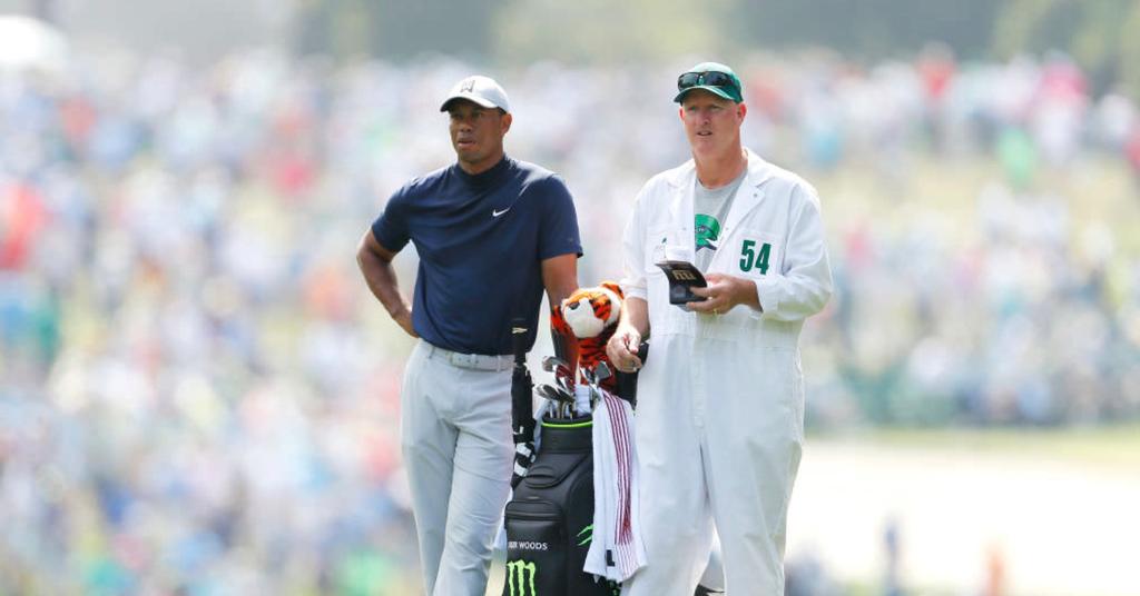 Why Do Caddies Wear Jumpsuits at the Masters Tournament?
