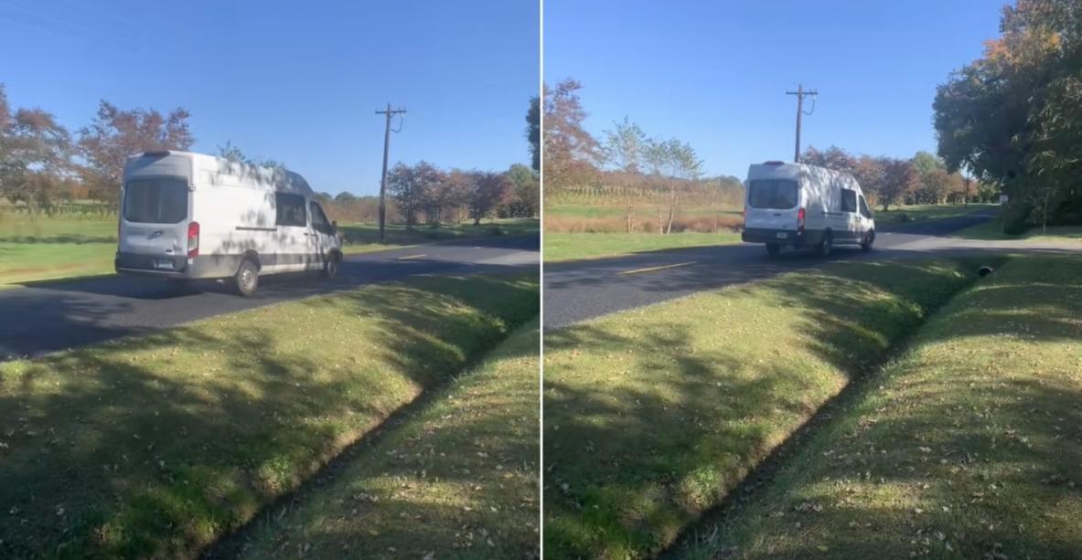 White Van Pulls Up to Runner on the Side of a Road