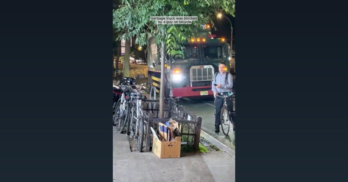 Biker Intentionally Blocks Garbage Truck, Sits in the Road