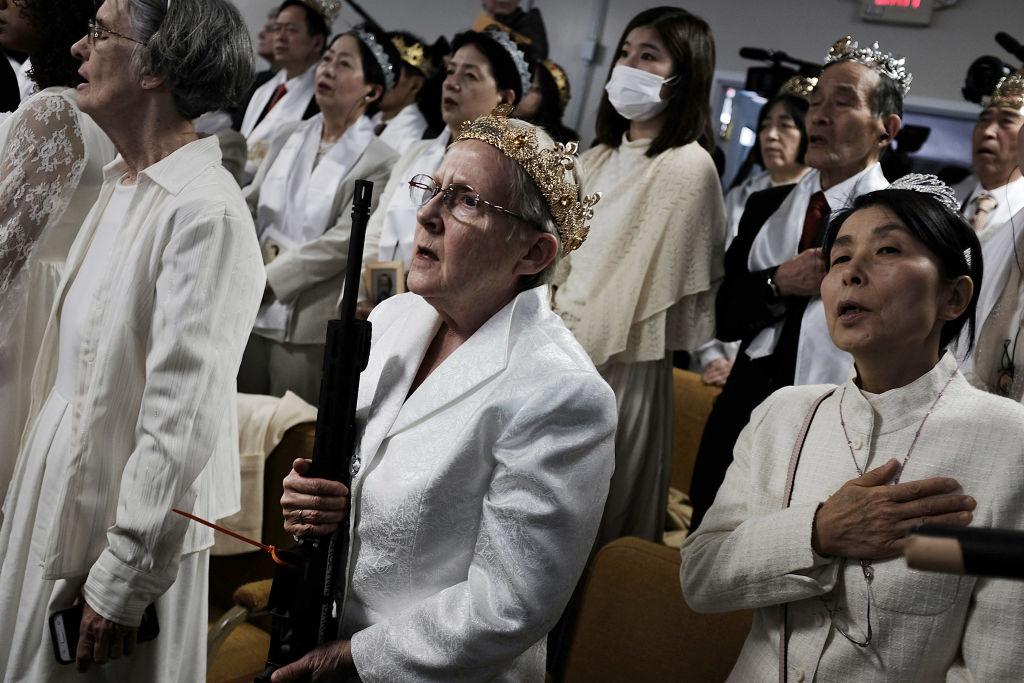 Church Holds "Blessing Ceremony" for Members and Their Guns