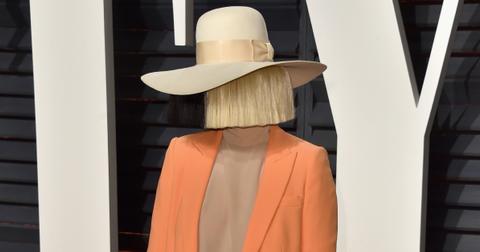 Why Does Sia Cover Her Face? Here's the Scoop