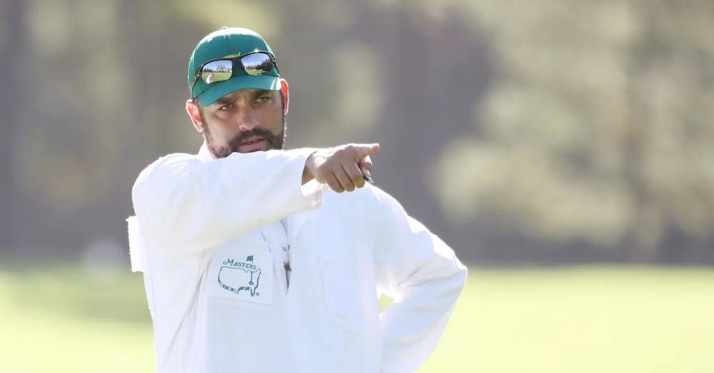 Why Do Caddies Wear Jumpsuits at the Masters Tournament?