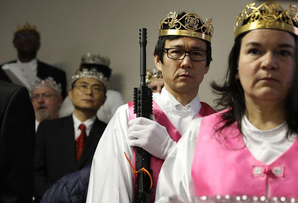 Church Holds "Blessing Ceremony" for Members and Their Guns