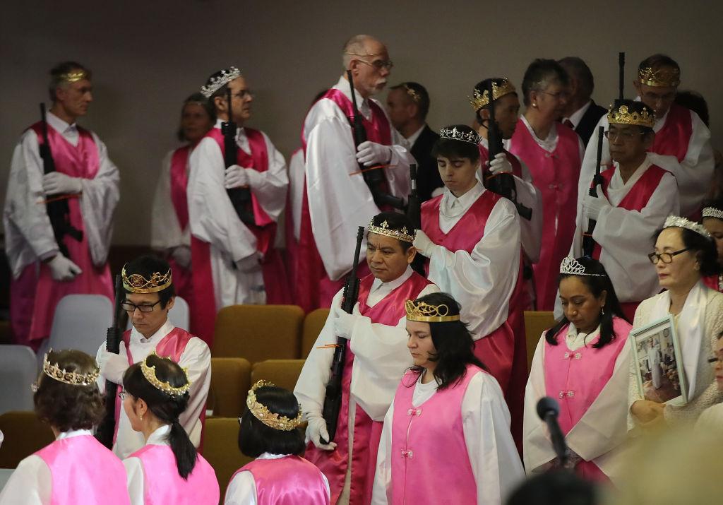 Church Holds "Blessing Ceremony" for Members and Their Guns