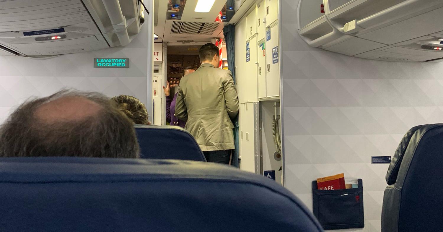 This Airplane Proposal Is Going Viral — See the Pics Taken by Passengers