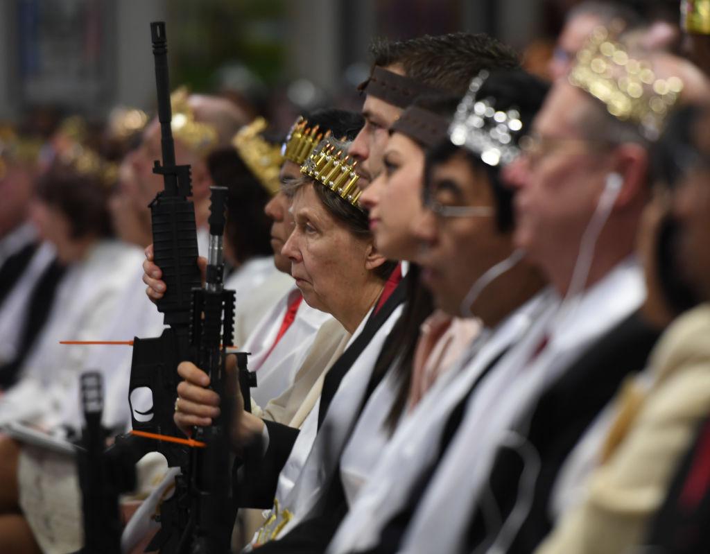 Church Holds "Blessing Ceremony" for Members and Their Guns