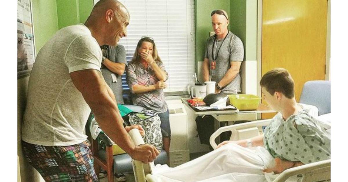 The only thing bigger than the Rock's biceps is his heart.