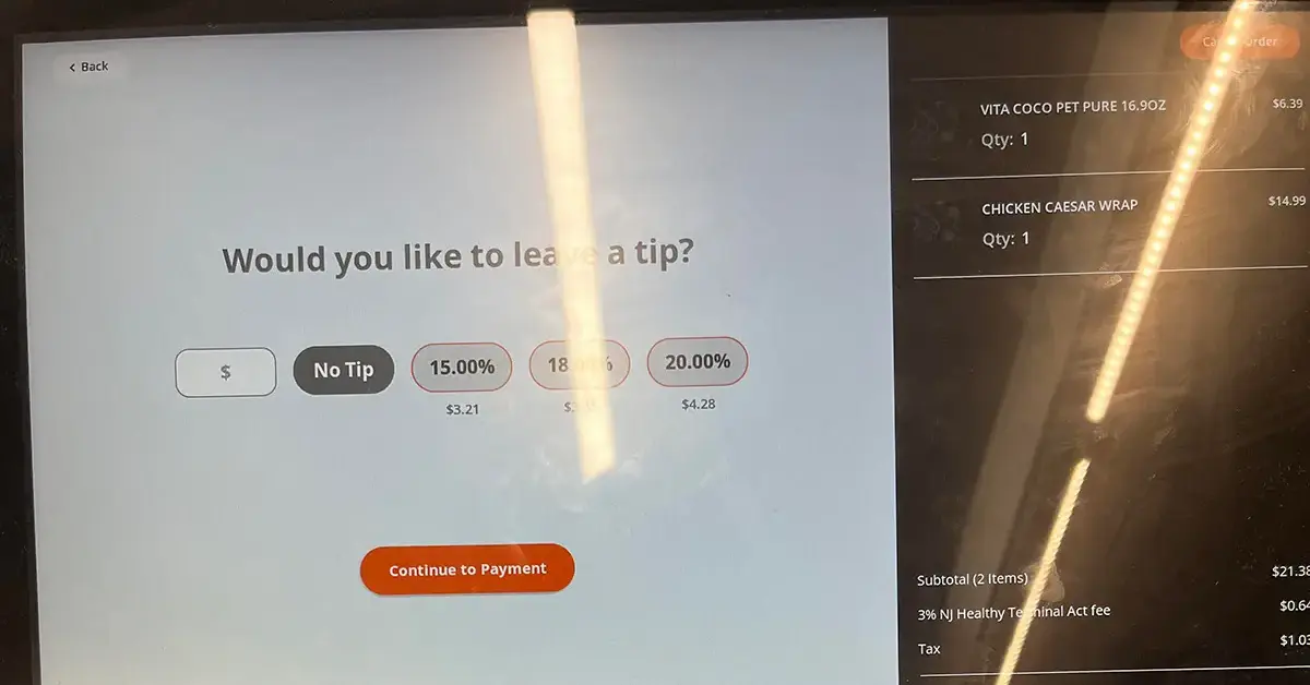 An Airport's Self-Checkout Kiosk Displays Tipping Prompt