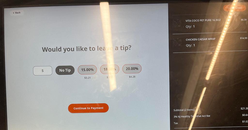 An Airport's Self-Checkout Kiosk Displays Tipping Prompt