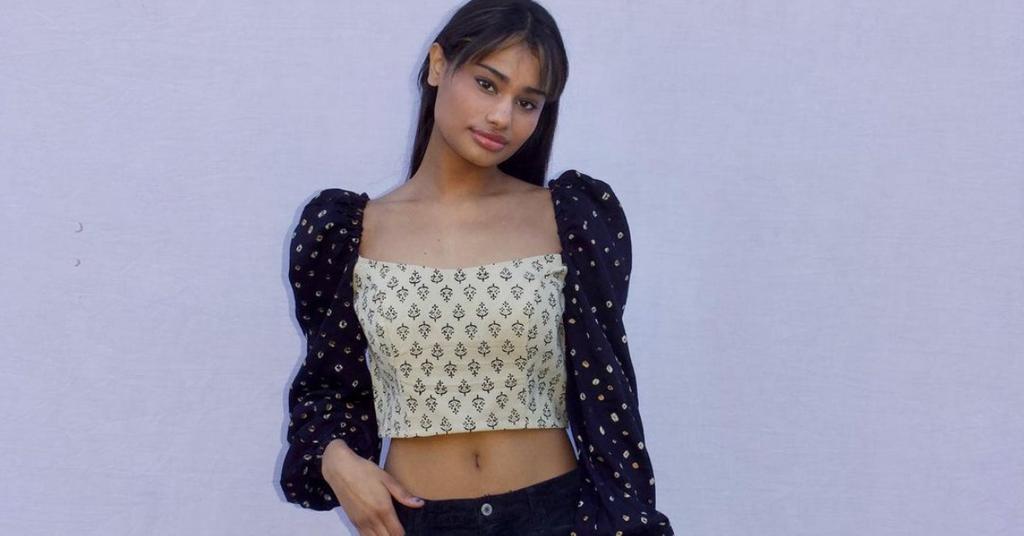 'Twentysomethings: Austin' Star Isha Models Her Clothing Line Outside ...